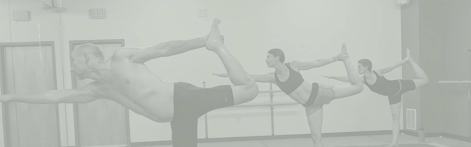 ROB-ERICA-ELAINE-STANDING-BOW-PULLING - Yoga is Medicine - Bikram Yoga