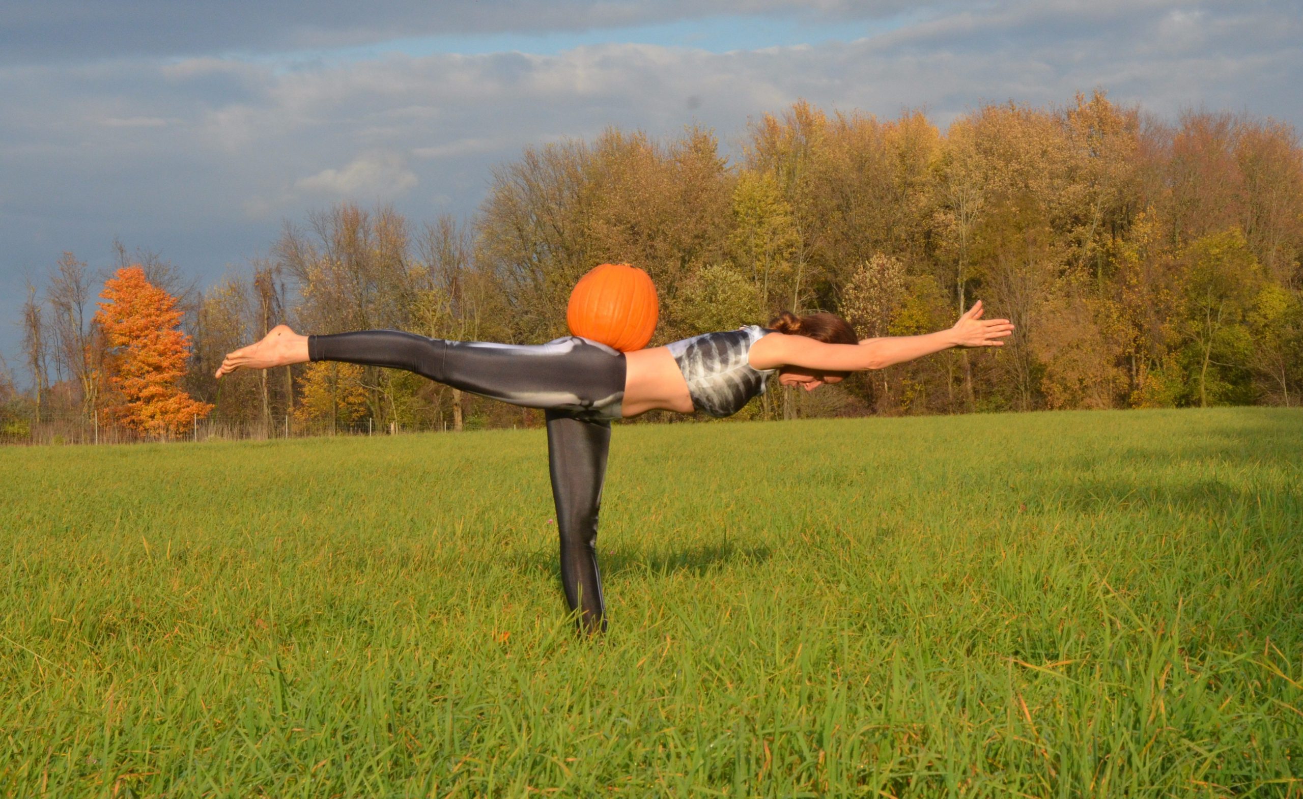 Balancing Stick with Pumpkin - Yoga is Medicine - Bikram Yoga